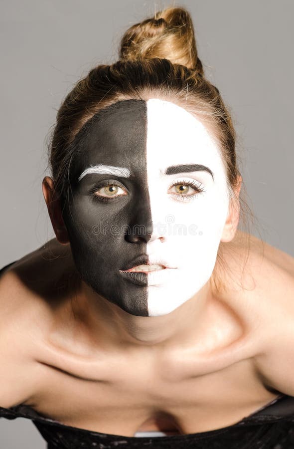 Face of Girl with Dual Greasepaint Stock Photo - Image of mystery ...