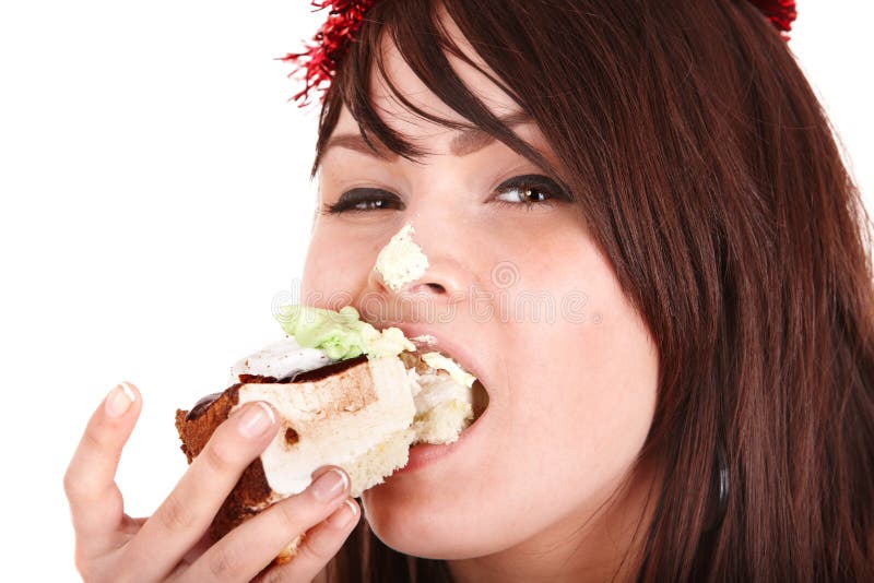 Face of girl eating cake. stock image. Image of beautiful - 13831523