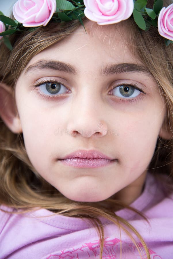 Face of Girl with Flowers on Head Stock Photo - Image of expression ...