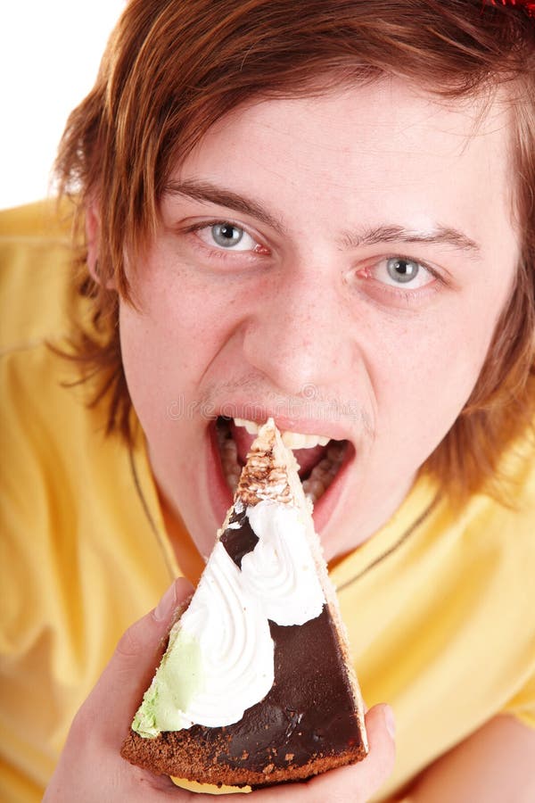 Face of man eating cake. stock image. Image of delight - 13817701