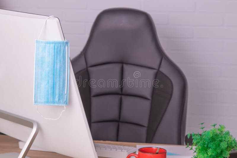 Face Mask on Computer Screen in Office Stock Image - Image of streaming ...