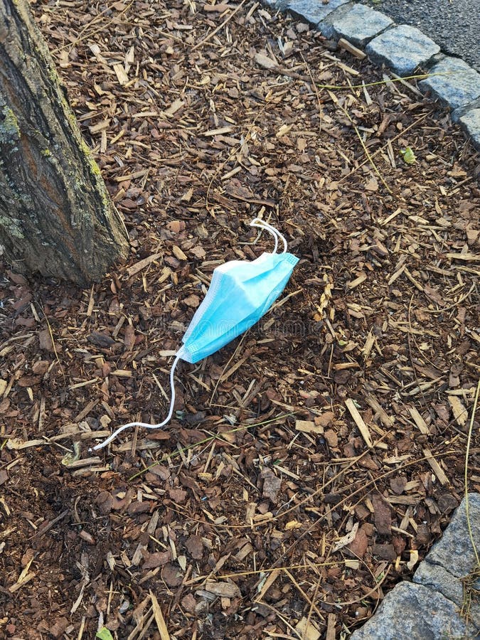 Face mask on the ground stock image. Image of organic - 231678031