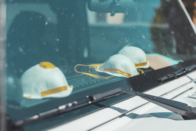 Face Mask daily Routine Concept: Surgical Mask in a Car Behind the ...