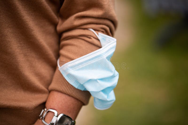 Face Mask on the Sleeve, Corona Stock Image - Image of isolated, face ...