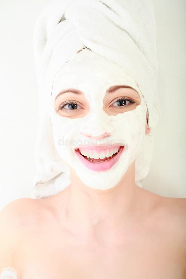 Face Skin Care. Beautiful Woman with Facial Cosmetic Mask at Spa Stock ...