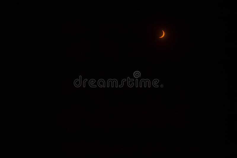 Face Partial Solar Eclipse when the Moon Shadows the Sun, Making the ...