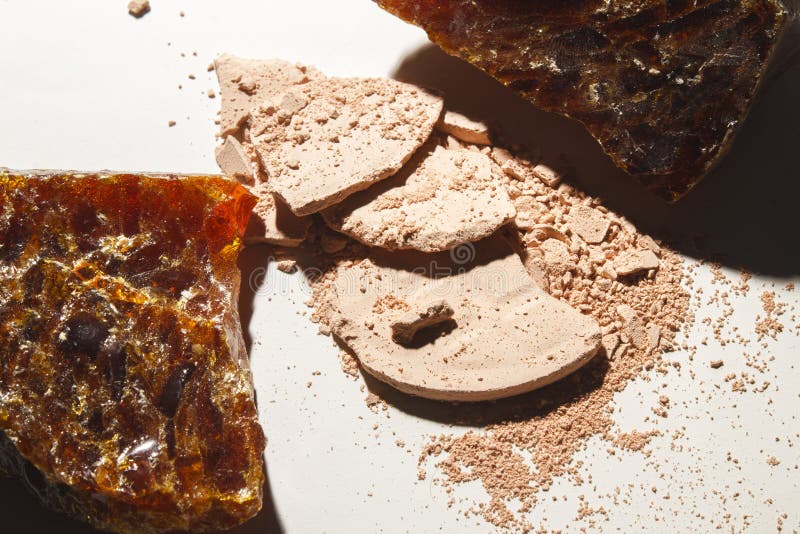 Face Powder. Broken Pieces of Cosmetic Powder with Hard Shadow ...