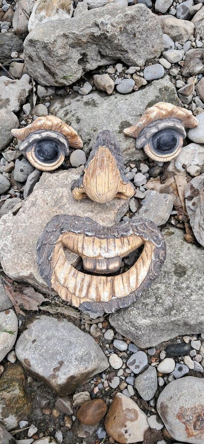 A face among rocks stock image. Image of eyes, geology - 378492521