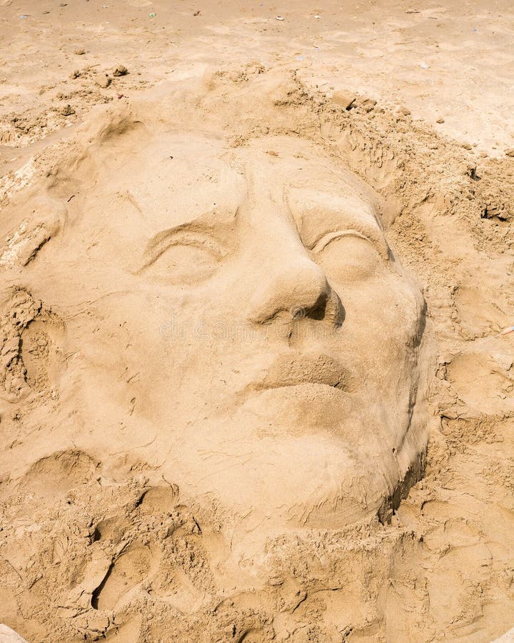 Face in the Sand. Beach Sand Sculpture Stock Image - Image of detail ...