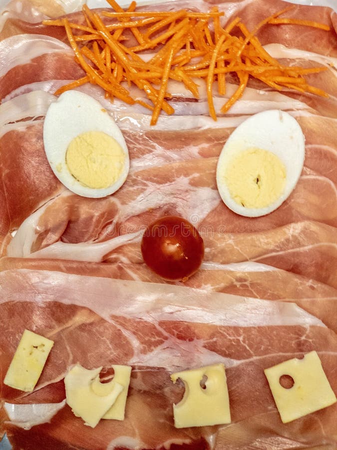 Face-shaped Parma Ham stock image. Image of prosciutto - 136880633