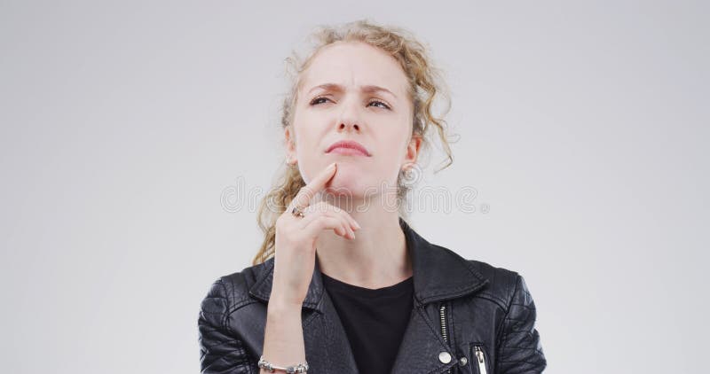 Face, Thinking and Question with Woman on Studio Space for ...