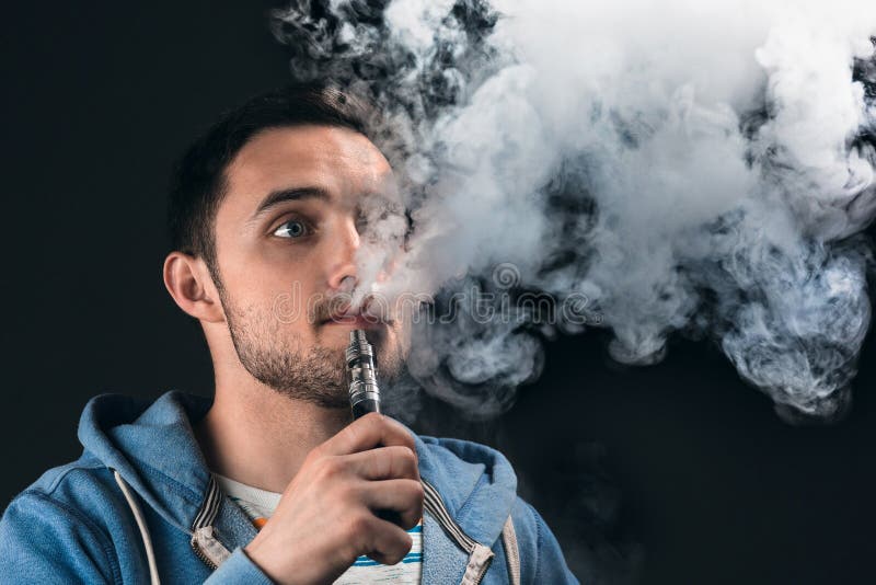 The Face of Vaping Young Man Stock Photo - Image of hair, exhales: 92890780