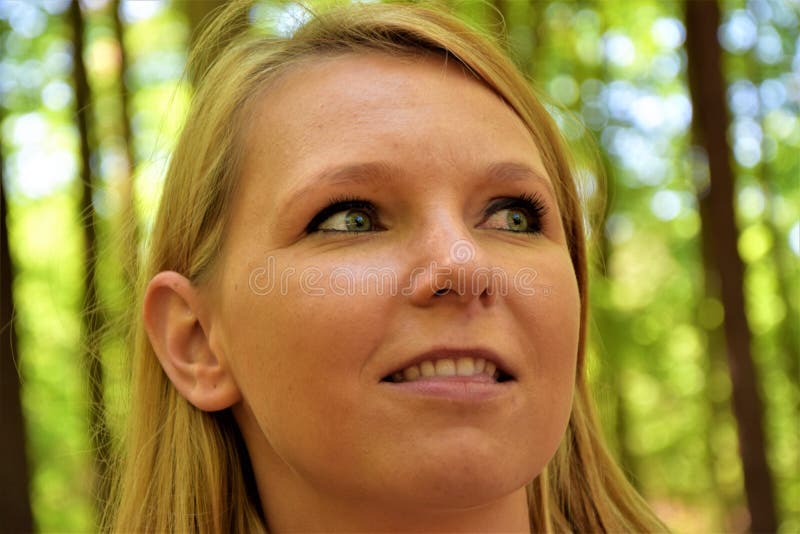 Face of a Woman with Blond Hair Looking Sideways Stock Image - Image of ...