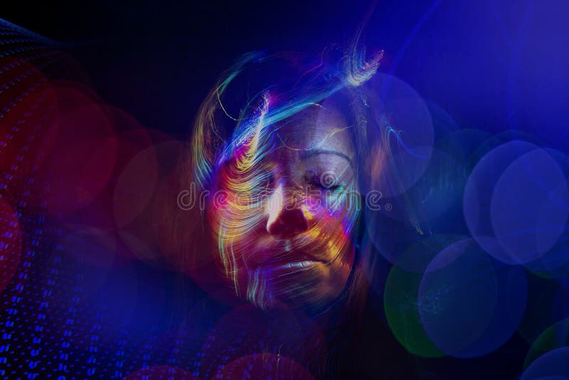 Face of a Woman with Light Effects from Light Painting. Concept of ...