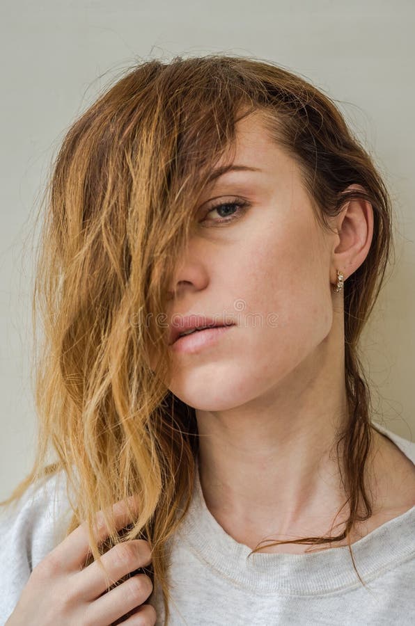 The Face of a Young Girl Covered with Long Hair Stock Image - Image of ...