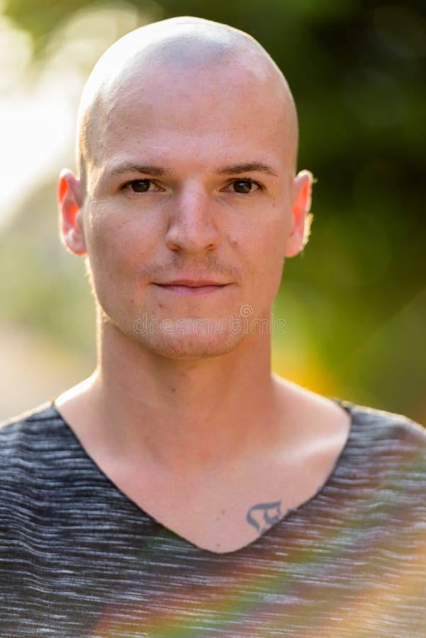 Face of Young Handsome Bald Man Outdoors Stock Image - Image of people ...