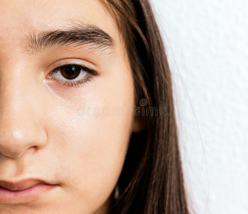 Face of a Young Hispanic Lady Looking Seriously at the Camera Stock ...