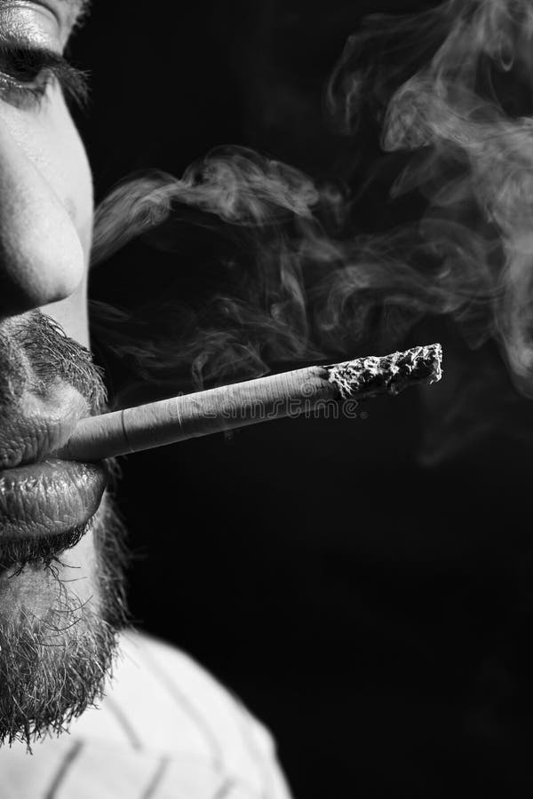 Face of a Young Man with a Cigarette Stock Photo - Image of head ...