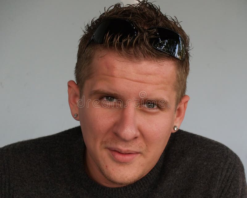 Face / Young Man with Ear Rings Stock Image - Image of hair ...
