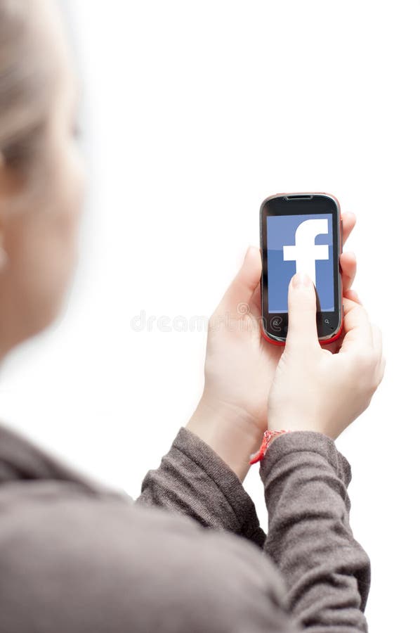Facebook Browsing on the Phone Editorial Stock Photo - Image of office ...