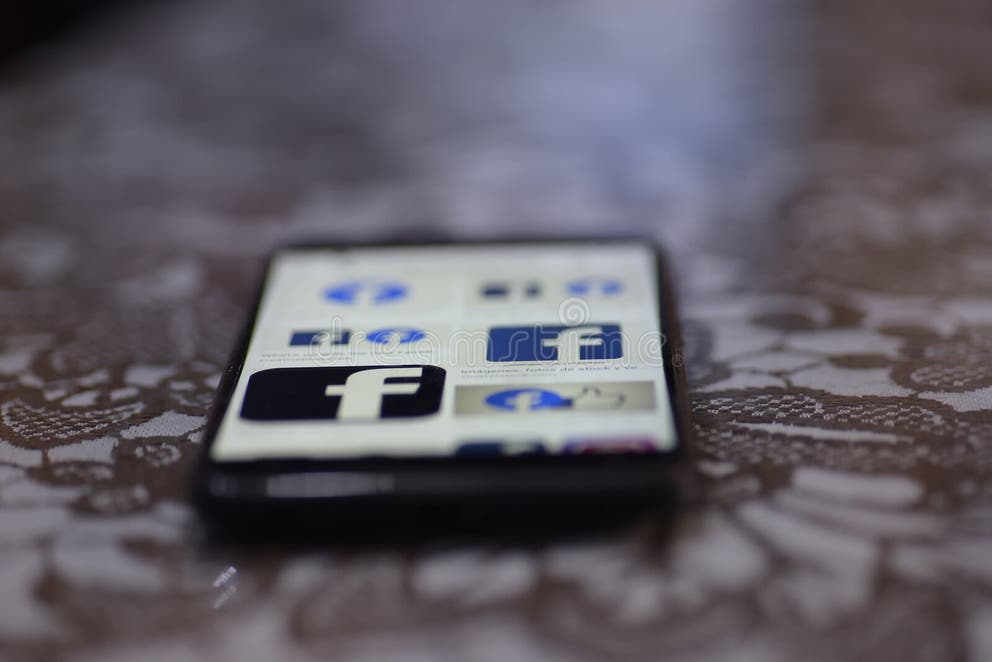 Facebook logo on mobile editorial stock photo. Image of button - 161691638