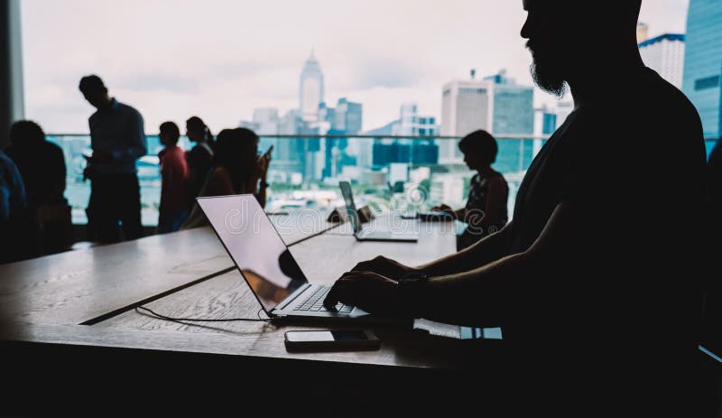 Faceless Man Typing on Laptop in Open Space Office Stock Photo - Image ...