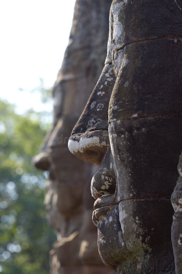 Faces of Angkor stock image. Image of buddhist, male - 26987379