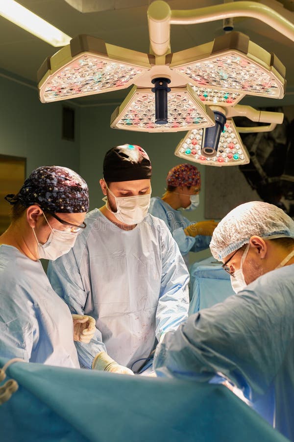 The Faces of Doctors Surgeons in Masks are a Big Plan, an Operating ...