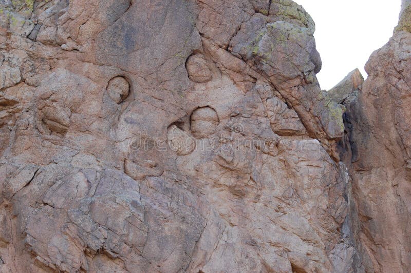 Faces in the Rock stock image. Image of damned, trapped - 52767735