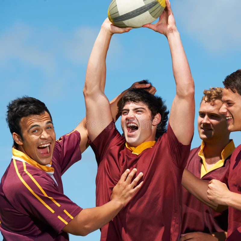 The Faces of Winners. a Young Rugby Team Celebrating a Victory. Stock ...