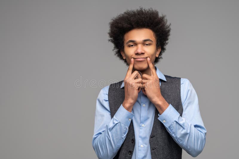 Dark-haired Young Man Pretending To Be Happy Stock Photo - Image of ...