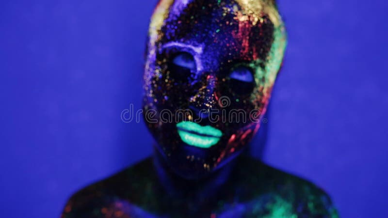 Facial Expressions Girl in Ultraviolet Light Stock Video - Video of ...