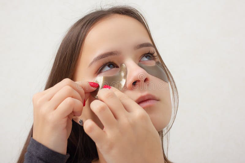 Facial Skin Care A Young Girl Makes Moisturizing Nourishing Patches
