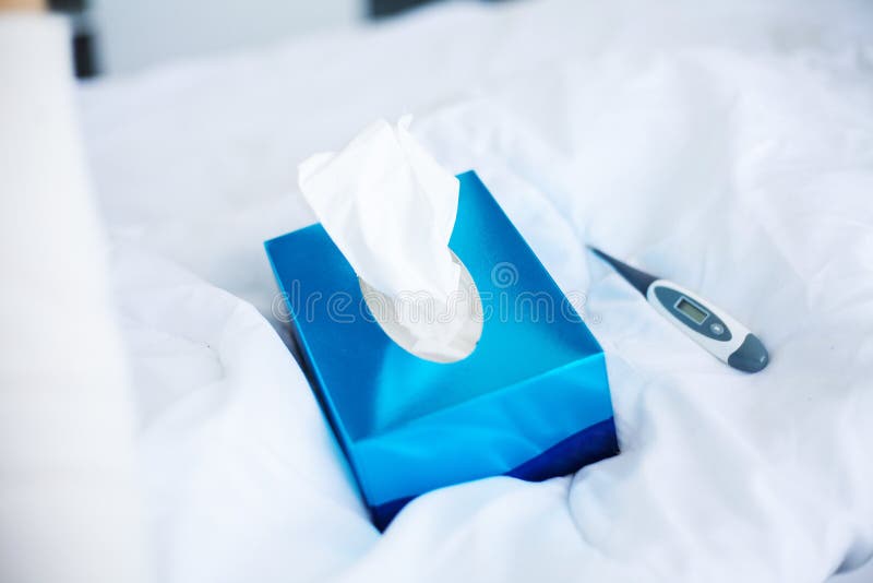 Facial Tissues Cube Box. Blue Pack Tissues on the Bed Stock Image ...