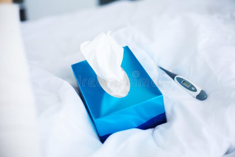Facial Tissues Cube Box. Blue Pack Tissues on the Bed Stock Image ...