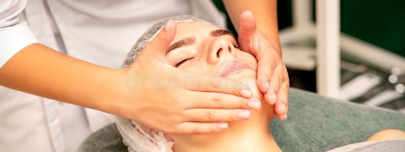 Facial Treatment Massage Beautiful Young Caucasian Woman With Perfect