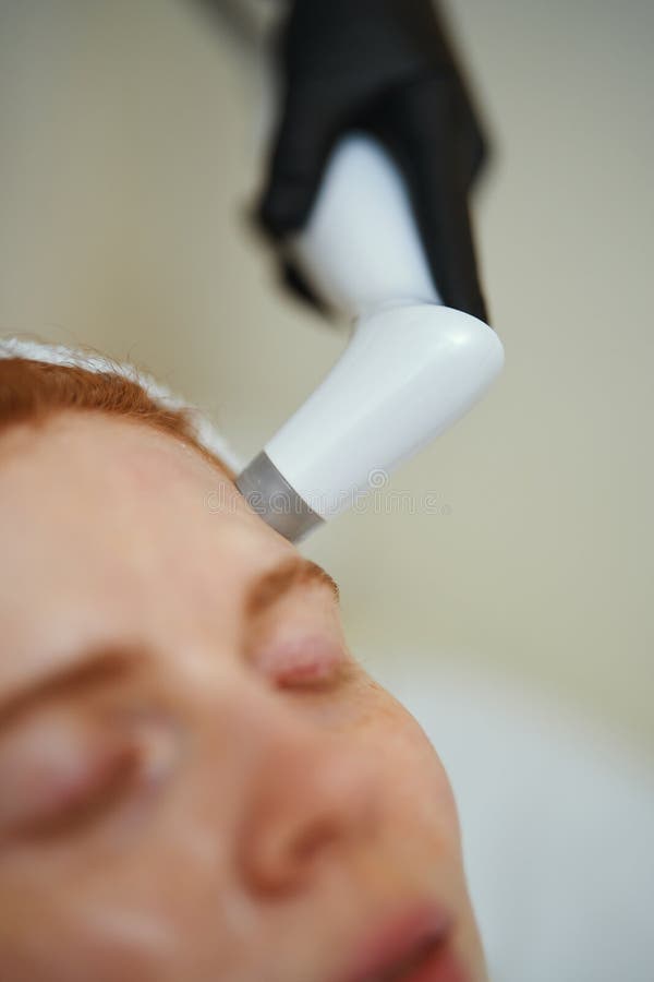 Facial Treatment Performed Using Advanced Skincare Technology in a ...