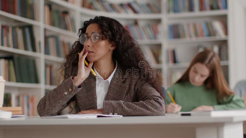 Perplexed Young Woman Student in Eyeglasses Thinking Over Difficult ...
