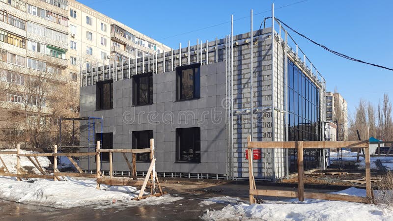 Facing a Building Under Construction with Square Stock Image - Image of ...