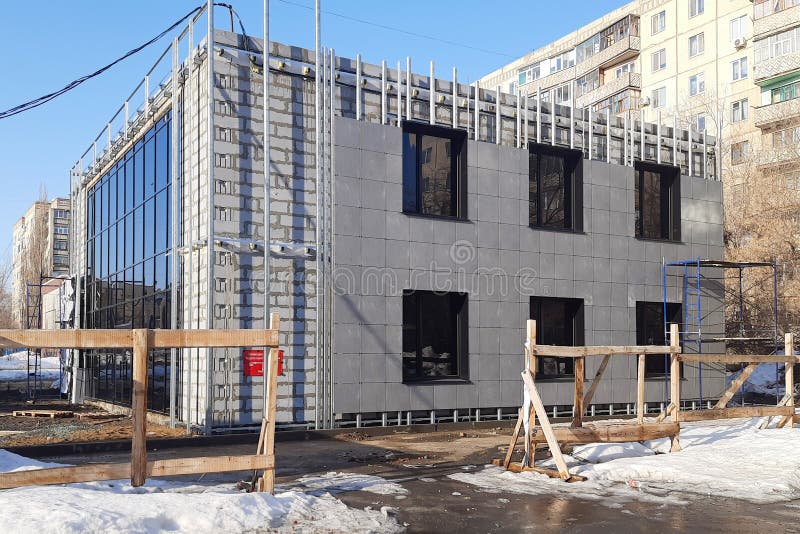 Facing a Building Under Construction with Square Panels Stock Image ...