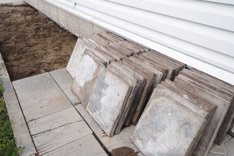 Facing Concrete Tiles Lie on Ground in Stack. Replacing Building ...