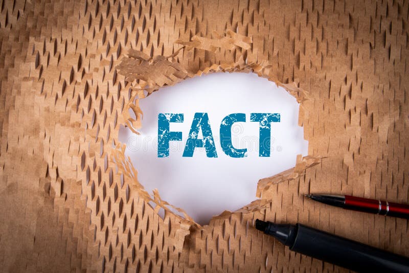 Fact Concept. Torn Cardboard and Stationery on a White Background Stock ...