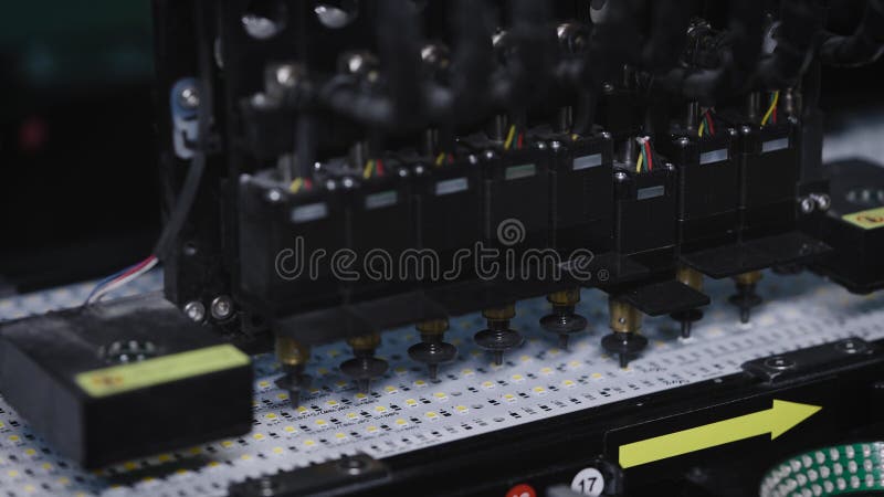 Factory for the Assembly of LED Lamps. High-tech Machine for Placing ...