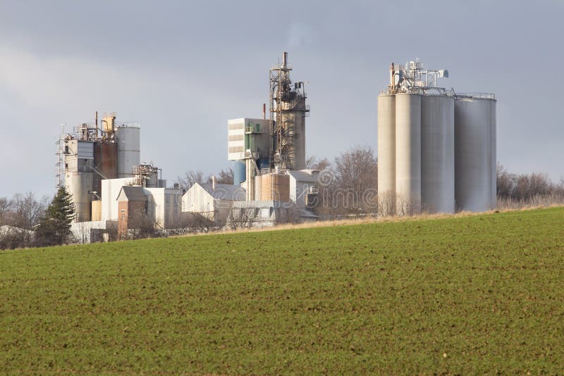 Factory behind field stock image. Image of business, detail - 22946837