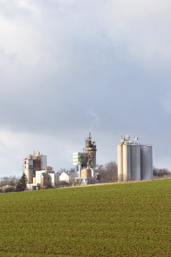 Factory behind field stock photo. Image of industry, building - 22954444