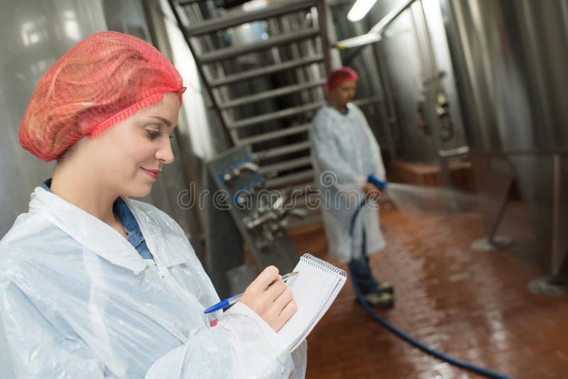 Factory Being Cleanned after Work Stock Photo - Image of hairnet, sweep ...