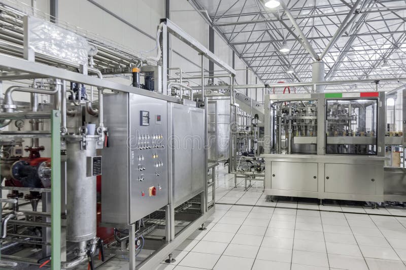 Factory for Bottling Beverages in Cans Stock Photo - Image of equipment ...