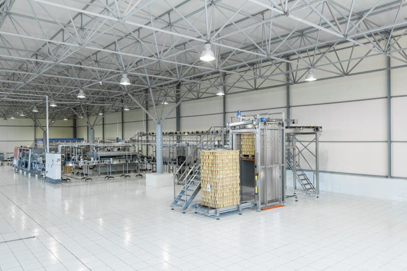 Factory for Bottling Beverages in Cans Stock Image - Image of automatic ...