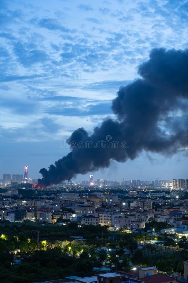Factory Catched a Fire with Lots Dark Smoke in Sunset Time Vertical ...