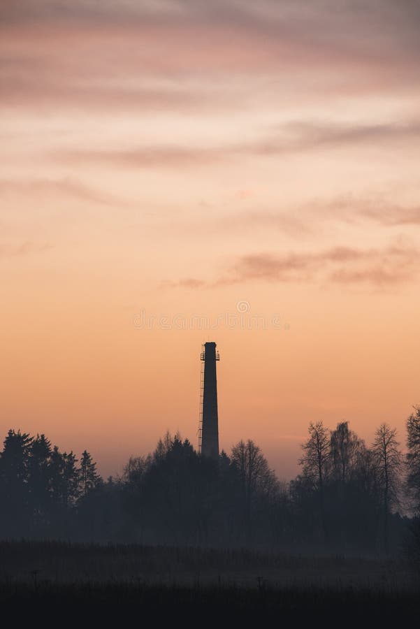 Factory Chimney in Forest at Sunset Stock Photo - Image of greenpeace ...